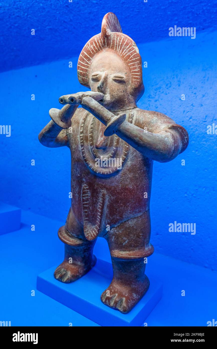 Ceramic figure playing the flute, from Colima. Rufino Tamayo Museum of ...