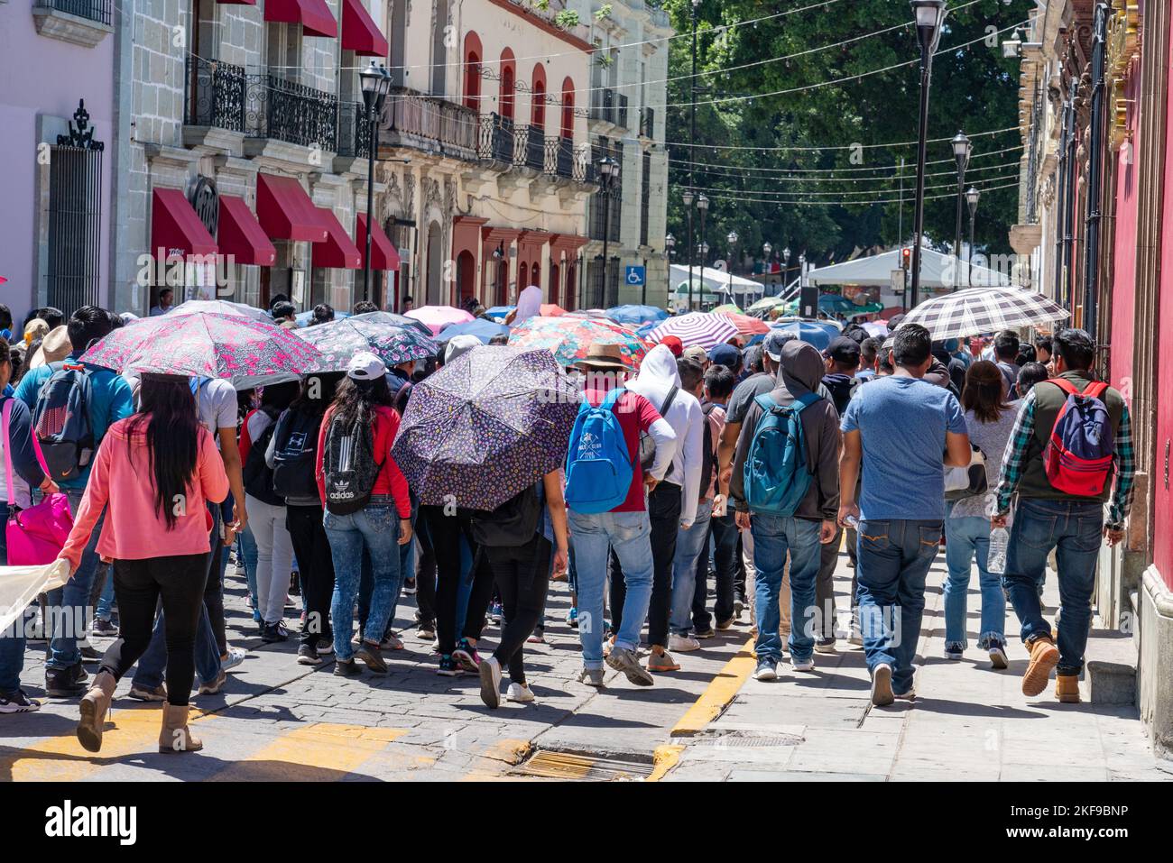 A protest march of students in the historic downtown of the city of ...