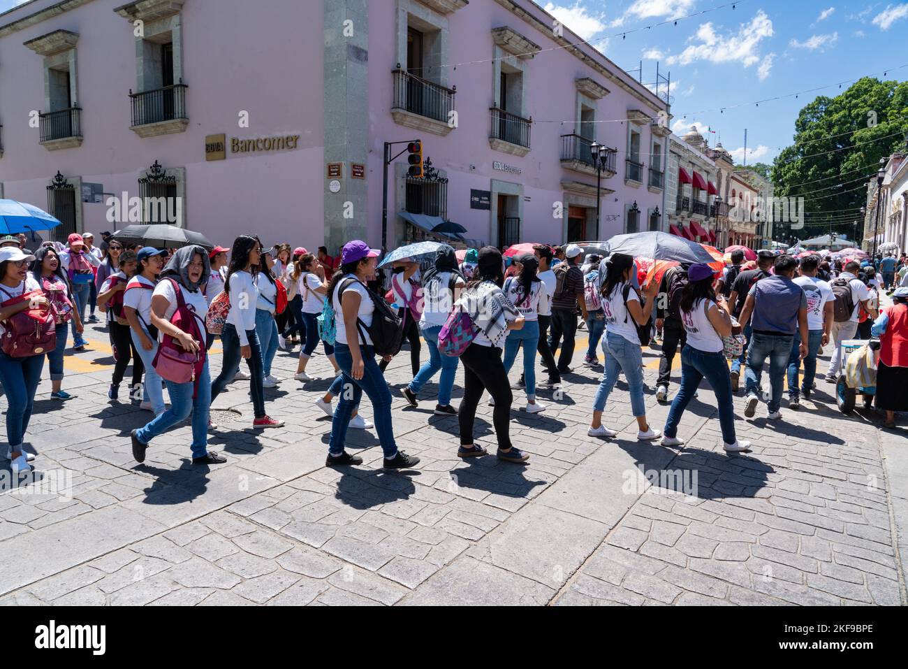 A protest march of students in the historic downtown of the city of ...