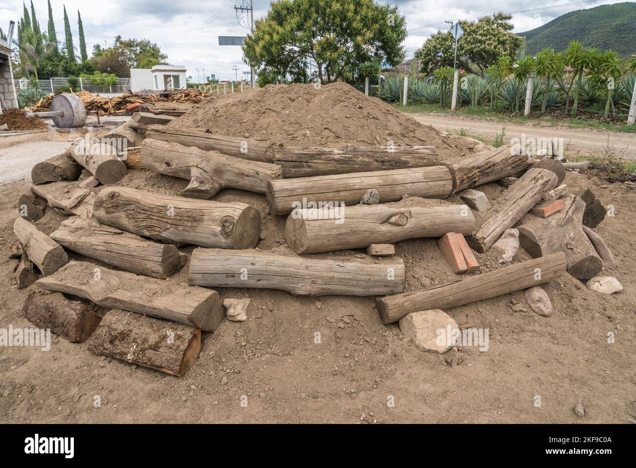 An oven in the process of roasting the agave hearts at an artisanal ...