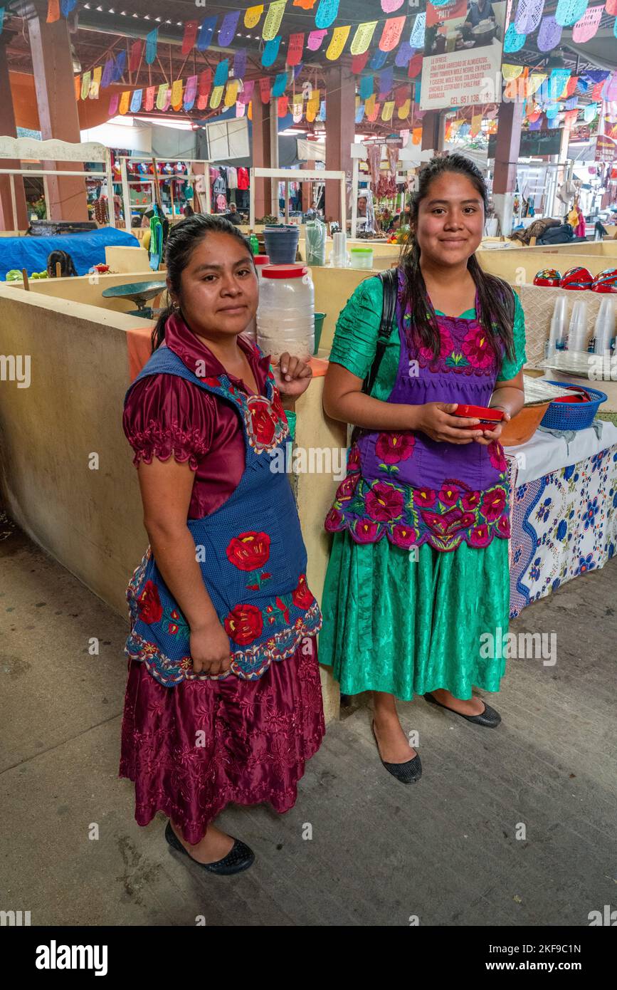 Two young Zapotec women from San Marcos Tlapazola in the market in ...