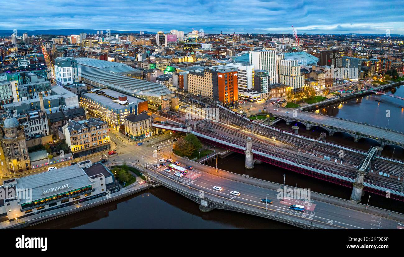 Aerial view from drone at dusk of skyline of Glasgow at Central Station ...