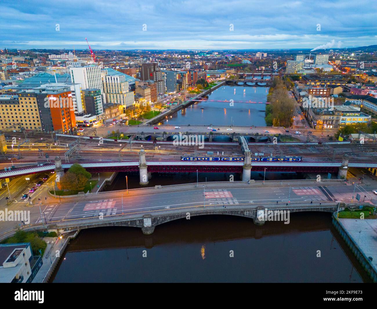Aerial view from drone at dusk of skyline of Glasgow at Central Station ...