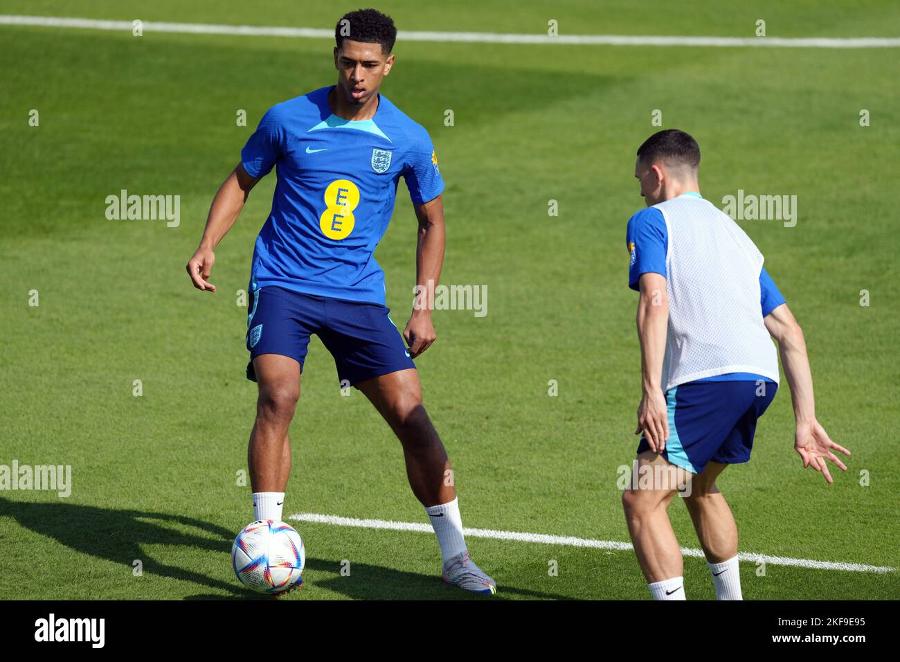 England's Jude Bellingham and Phil Foden (right) during a training ...