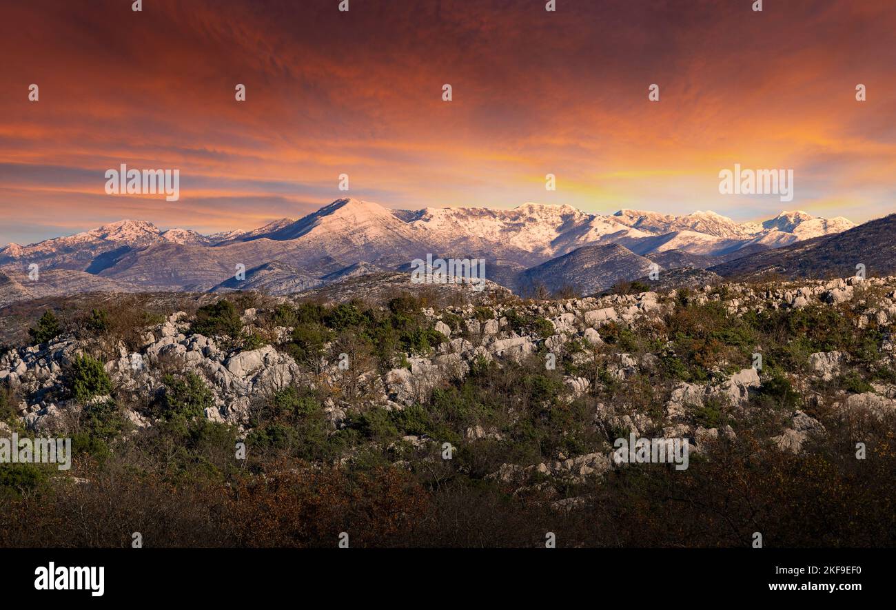 Dramatic sunset over mountains. Colorful sky Stock Photo - Alamy