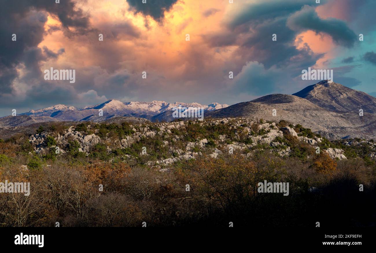 Dramatic sunset over mountains. Colorful sky Stock Photo - Alamy