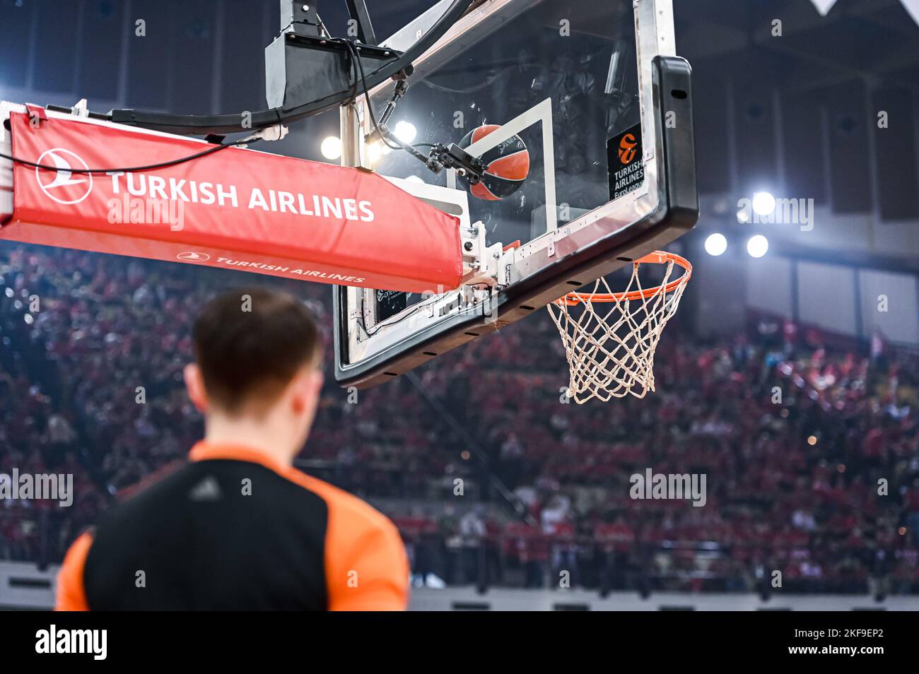 Indoor basketball basket net of white rope view from underneath against ...