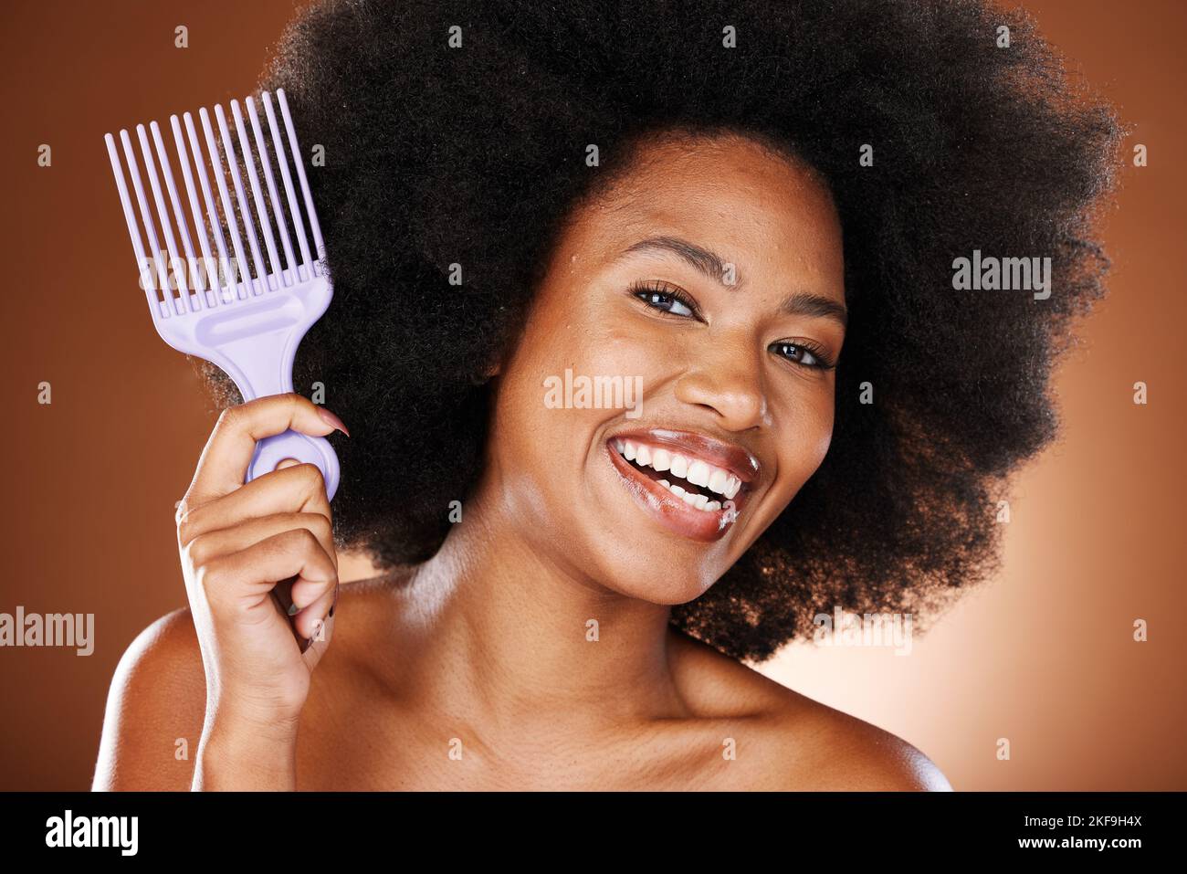Happy black woman, hair care and comb in portrait with afro pick ...