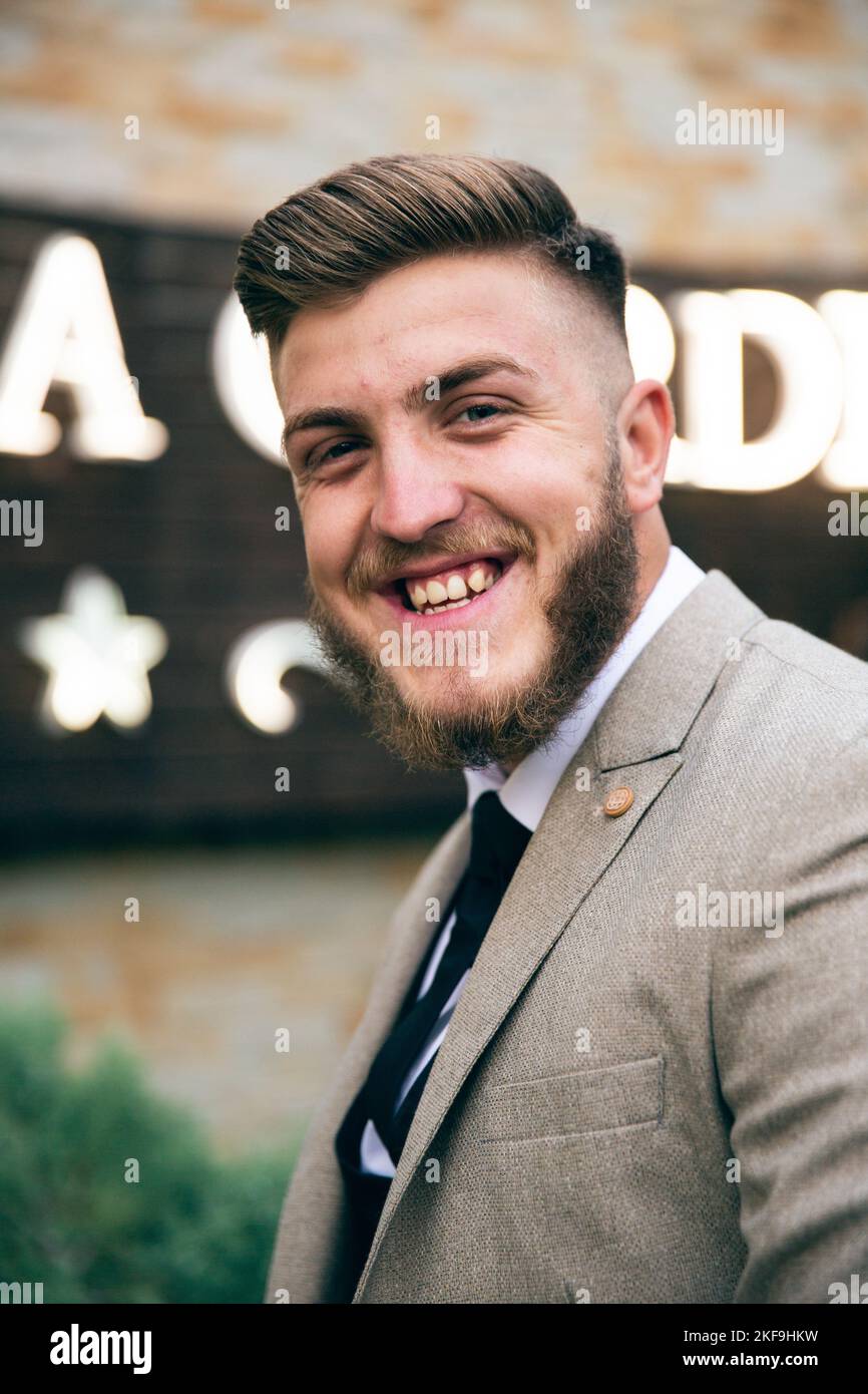 A shallow focus of a white Caucasian man smiling at the camera Stock ...