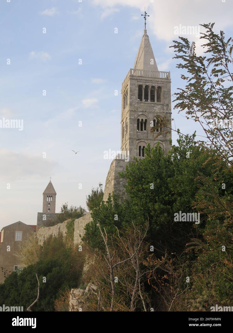 Tall bell towers punctuate the skyline on the Croatian island of Rab ...