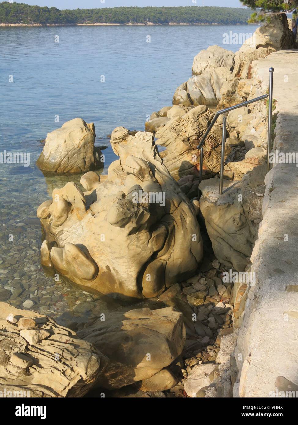 The Croatian island of Rab: rocky outcrops of sandstone protrude ...