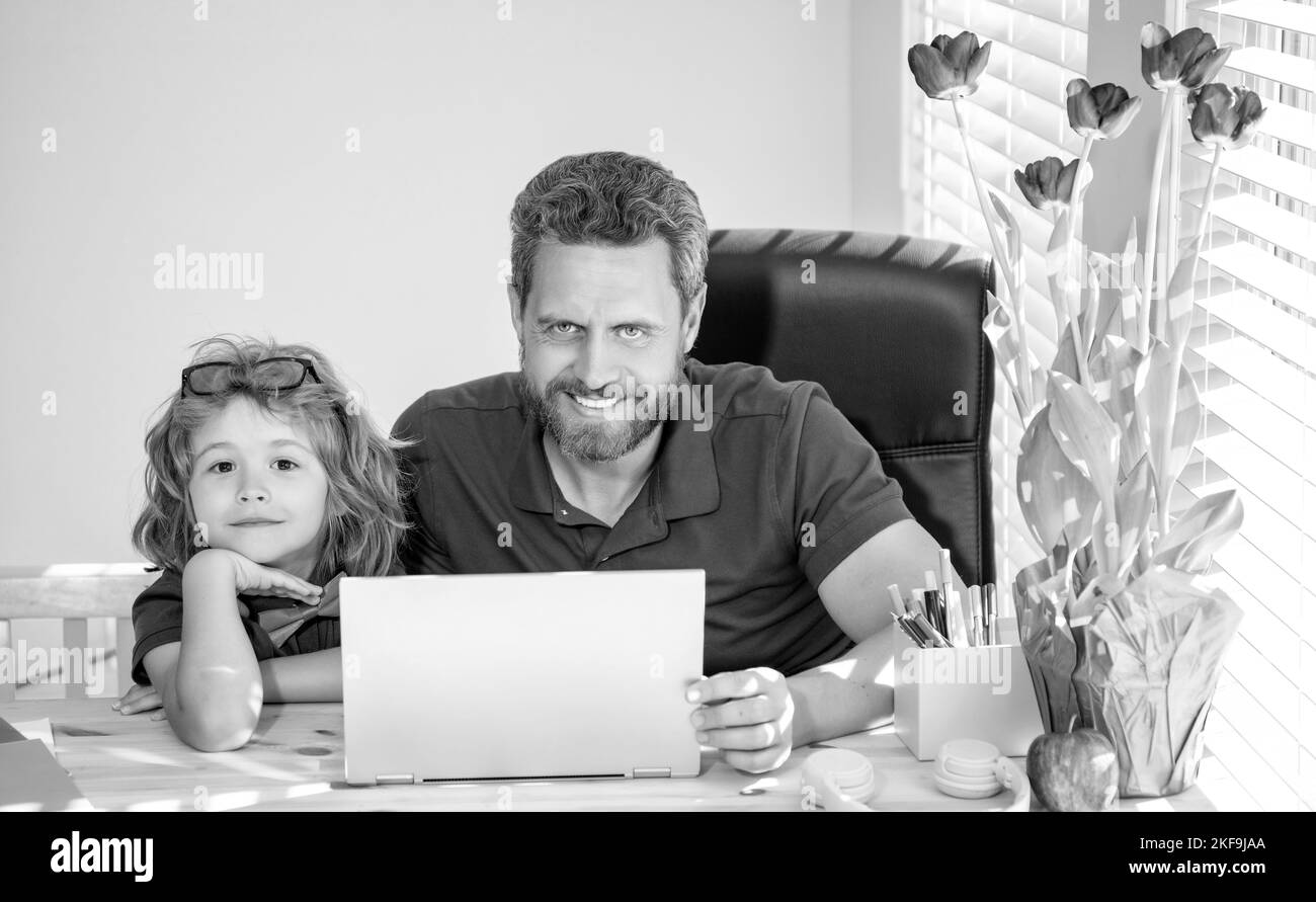 mature man teacher or dad helping kid son with school homework on ...