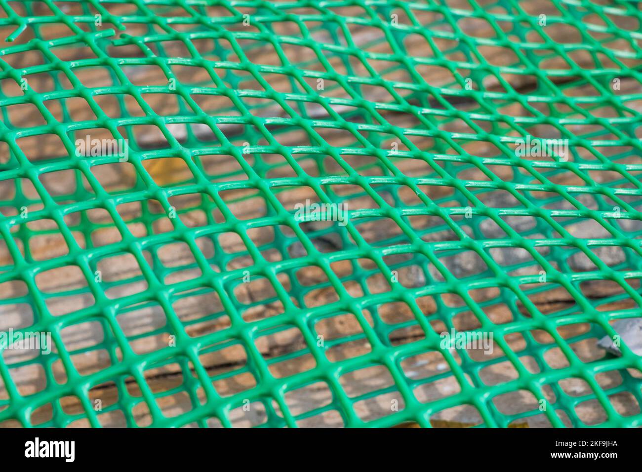 Plastic fence background, green fence close-up and texture Stock Photo ...