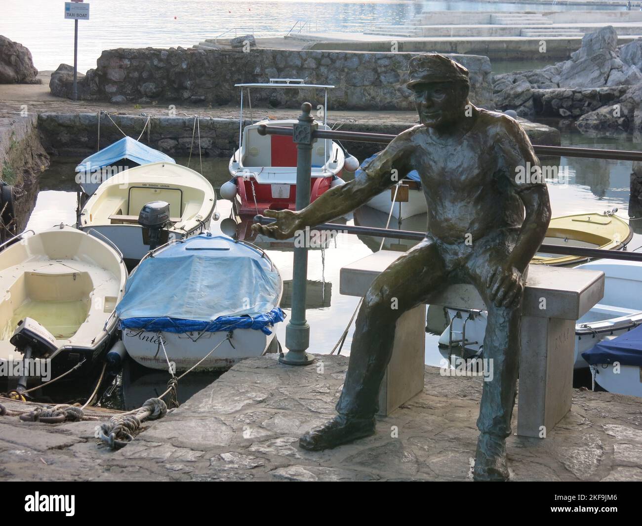 Visit Croatia: Statue of the Golden Fisherman at the little marina on ...