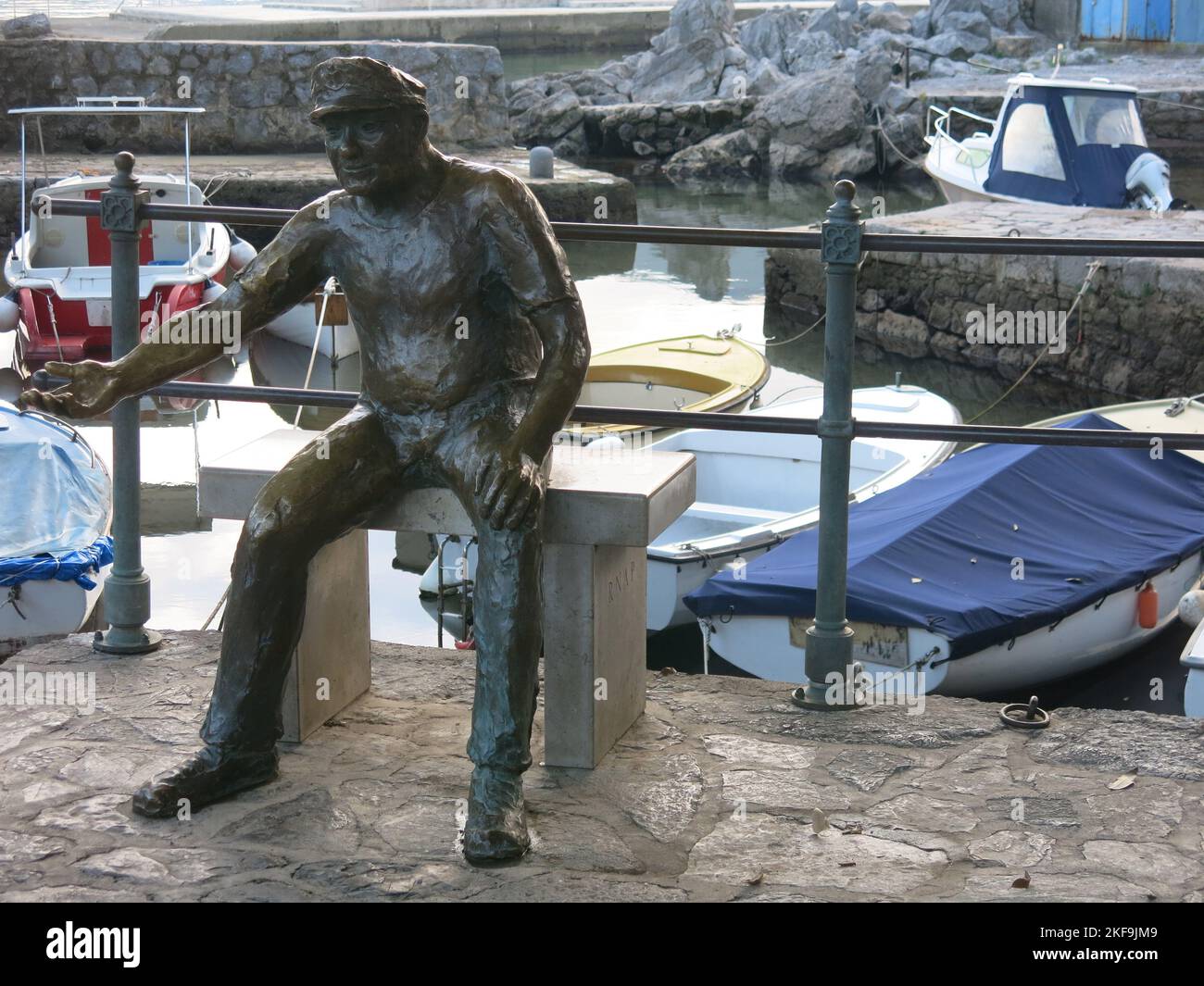 Visit Croatia: Statue of the Golden Fisherman at the little marina on ...