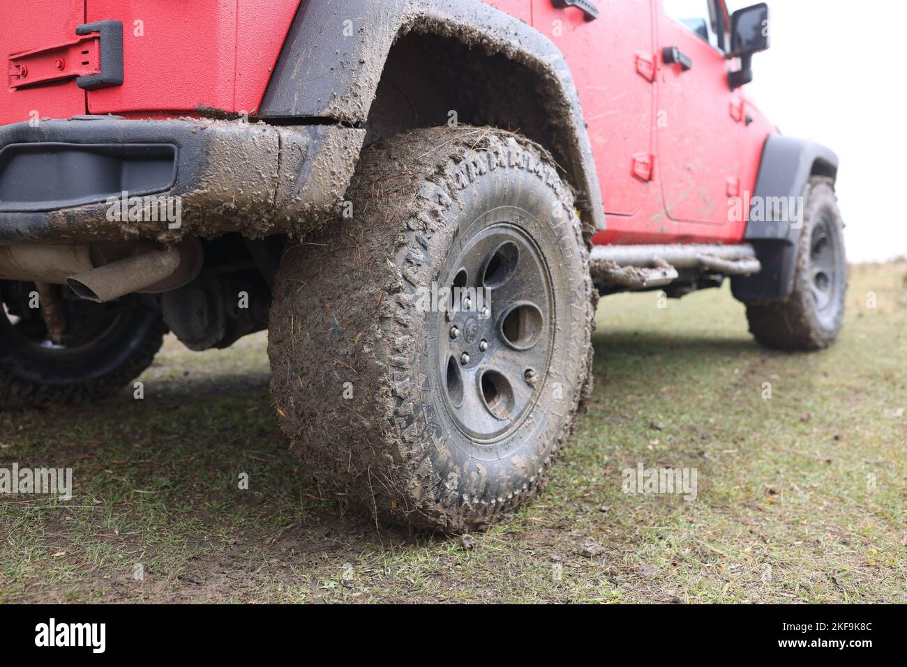 Offroad car concept with dirty road, wheel close-up Stock Photo - Alamy