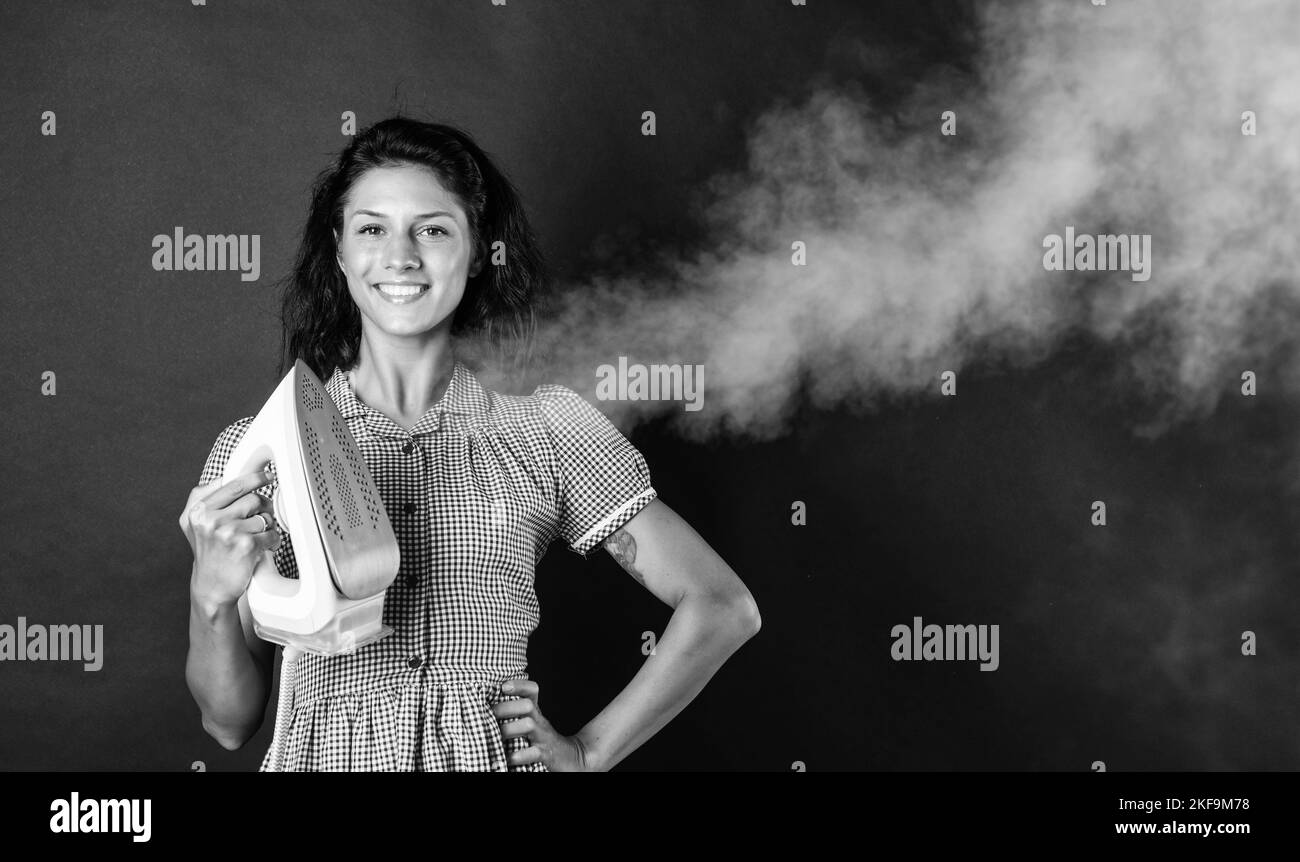 happy wife. vintage woman ironing clothes. housekeeping. pinup girl use ...