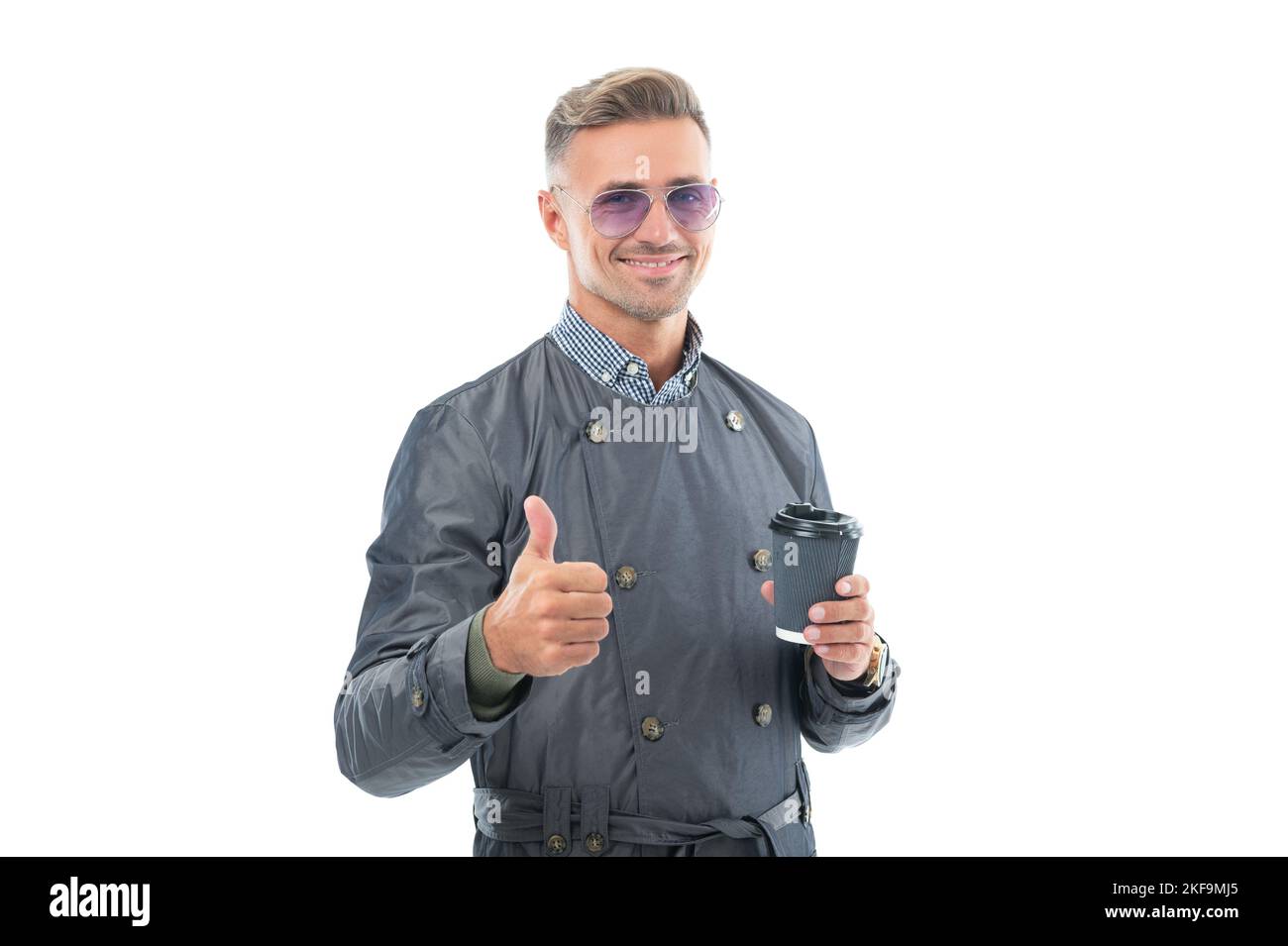 Happy smiling business man businessman director in coat giving thumbs ...