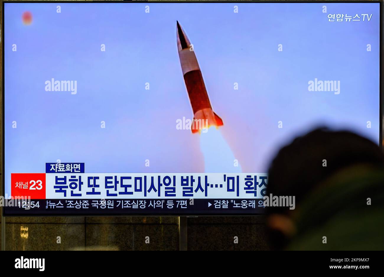 A TV screen shows a file image of North Korea's missile launch during a ...