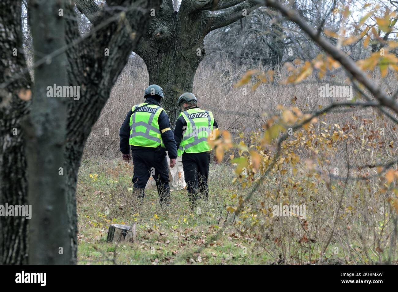 KHERSON, UKRAINE - NOVEMBER 16, 2022 - Investigators examine the ...