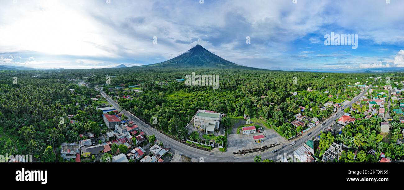 A scenic shot of the Mayon volacano covered with clouds in Philippines ...