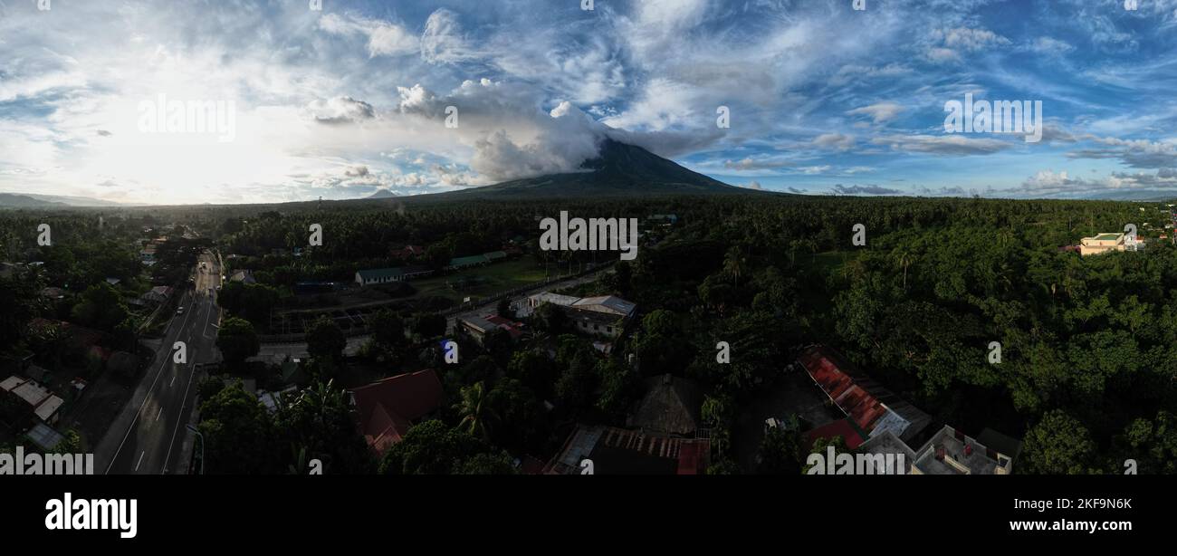 A scenic shot of the Mayon volacano covered with clouds in Philippines ...