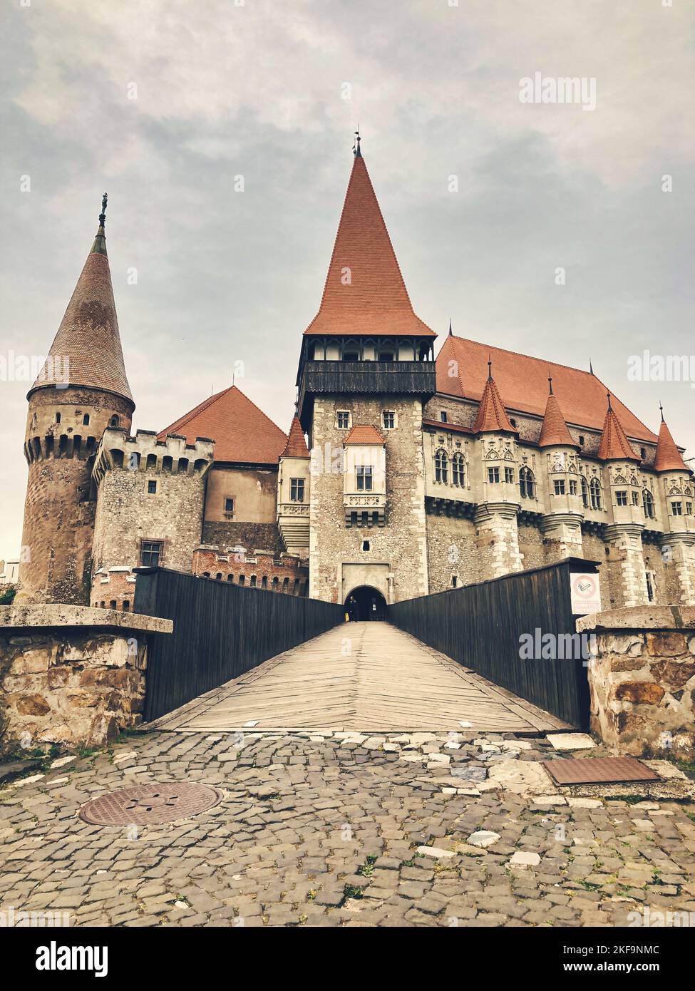A vertical shot of gothic facade of the Corvinus castle in Hunedoara ...