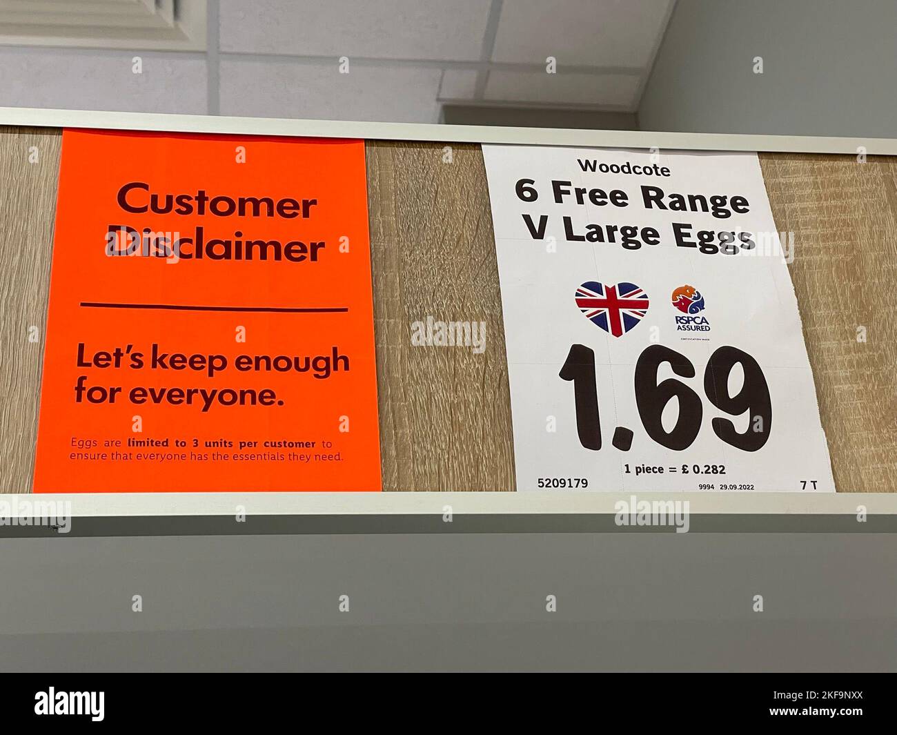 Signage for eggs on on the shelves in a Lidl store in Slough. Asda and ...