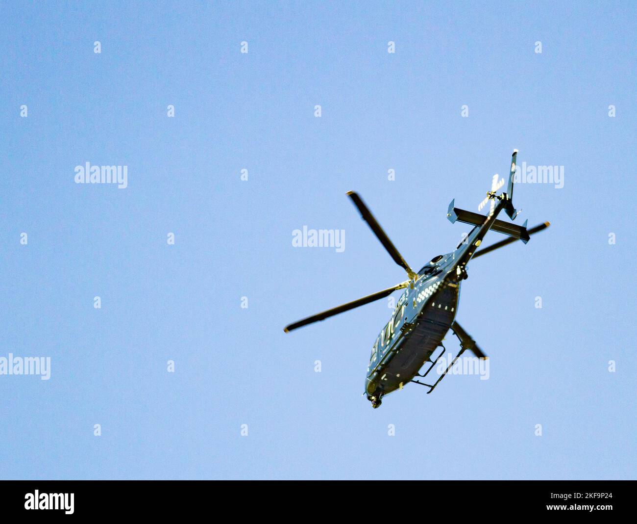 Helicopter overhead on a bright day Stock Photo - Alamy