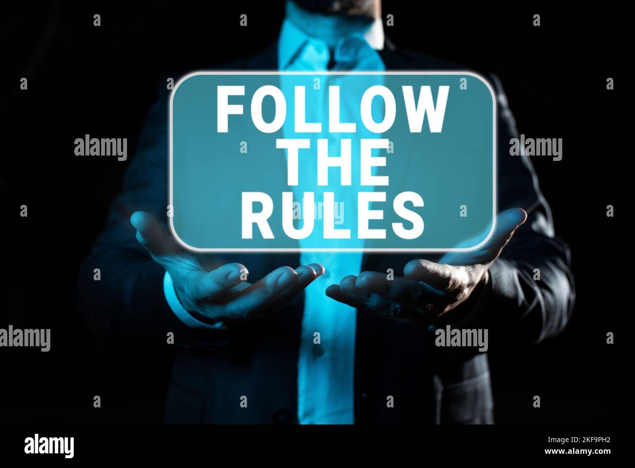 Hand writing sign Follow The Rules. Concept meaning learn to conform ...