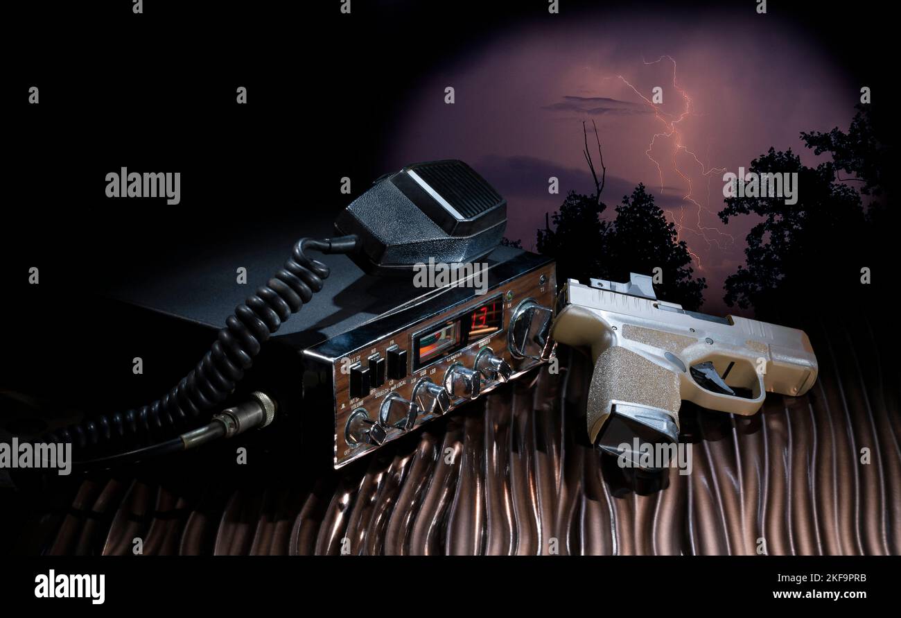 Lightning strike behind a handgun and a CB radio Stock Photo - Alamy