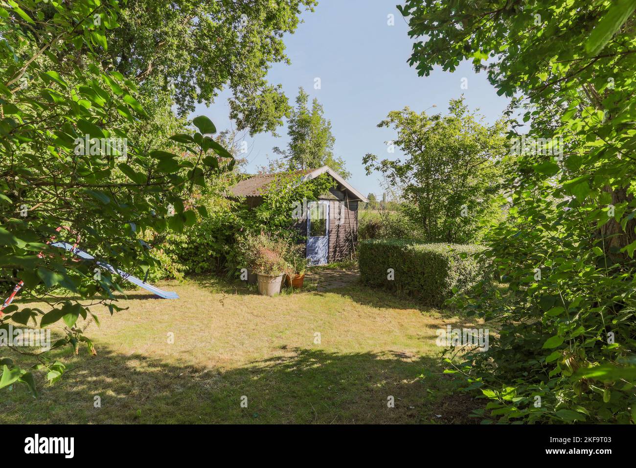 Simple patio with garden Stock Photo - Alamy