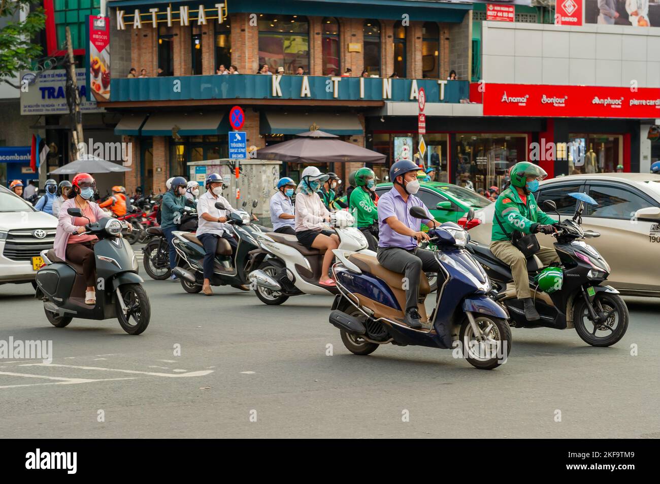 Saigon Street Life. A rush hour motorcycle swarm in Ho Chi Minh City ...