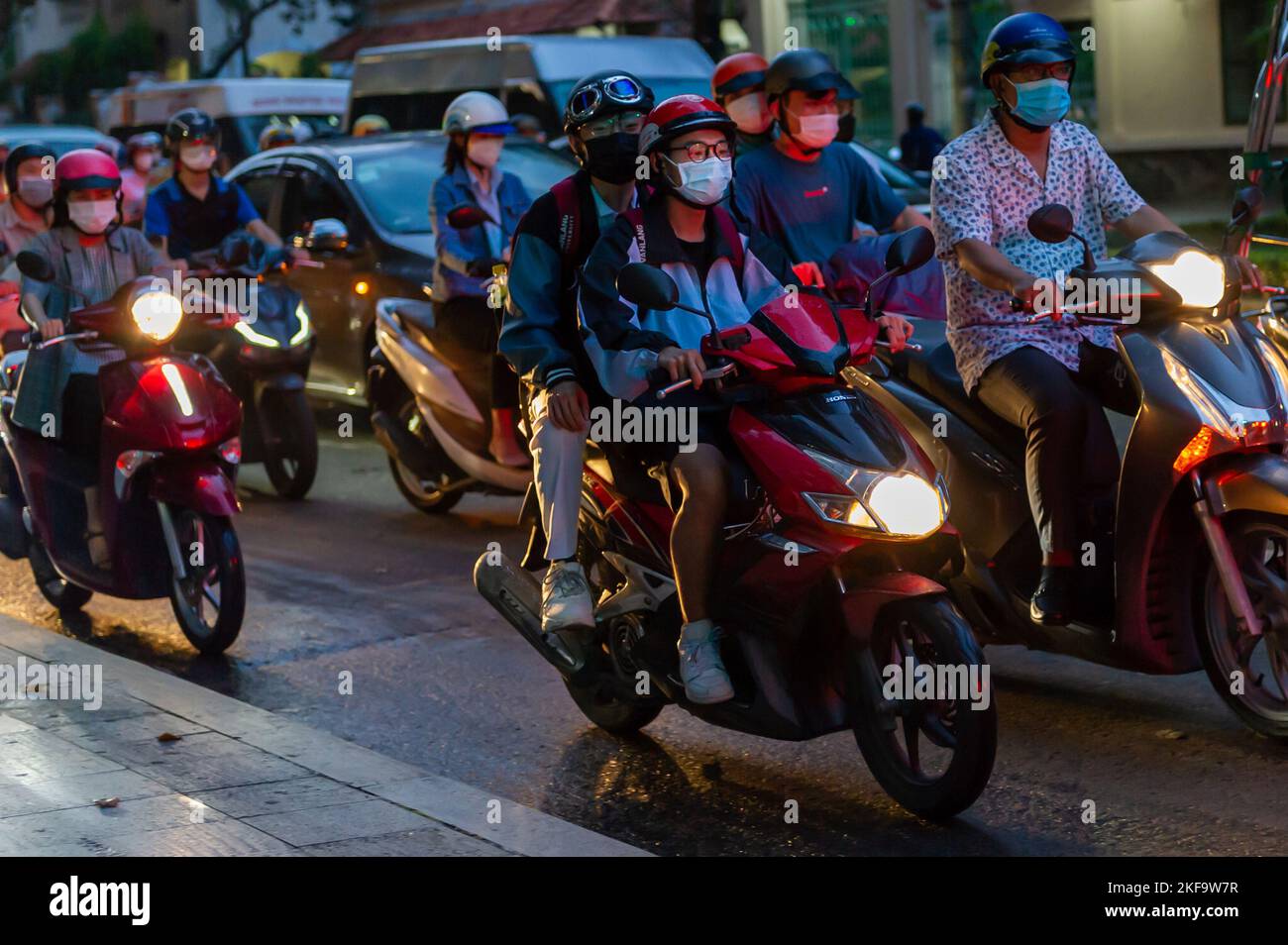 Saigon Street Life. A rush hour motorcycle swarm a dusk in Ho Chi Minh ...