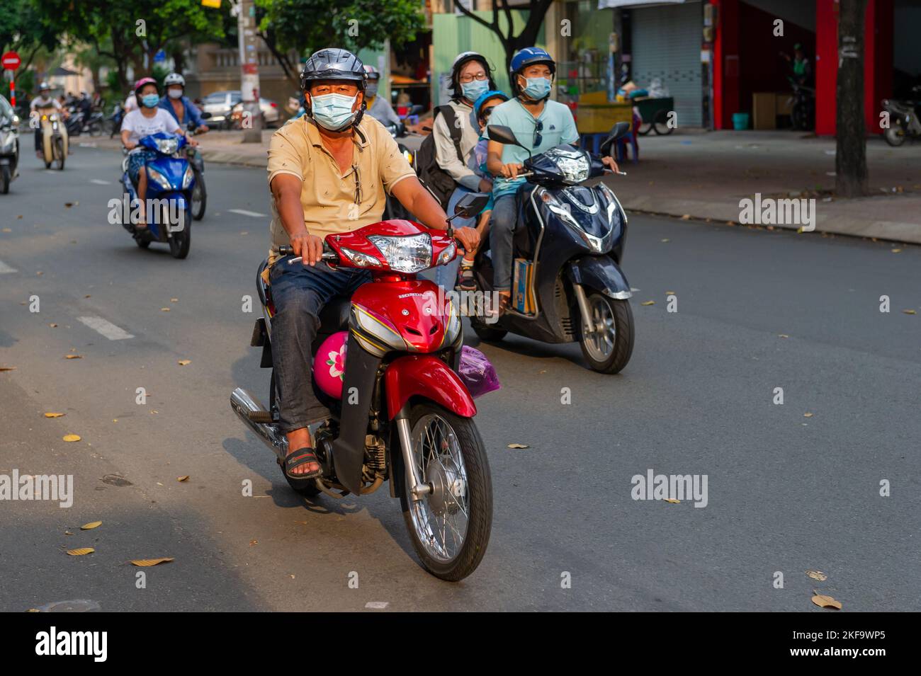 Saigon Street Life. A rush hour motorcycle swarm in Ho Chi Minh City ...