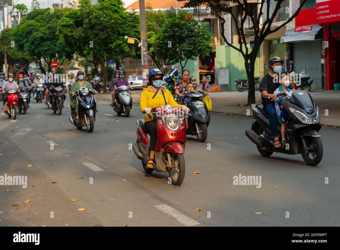 Saigon Street Life. A rush hour motorcycle swarm in Ho Chi Minh City ...