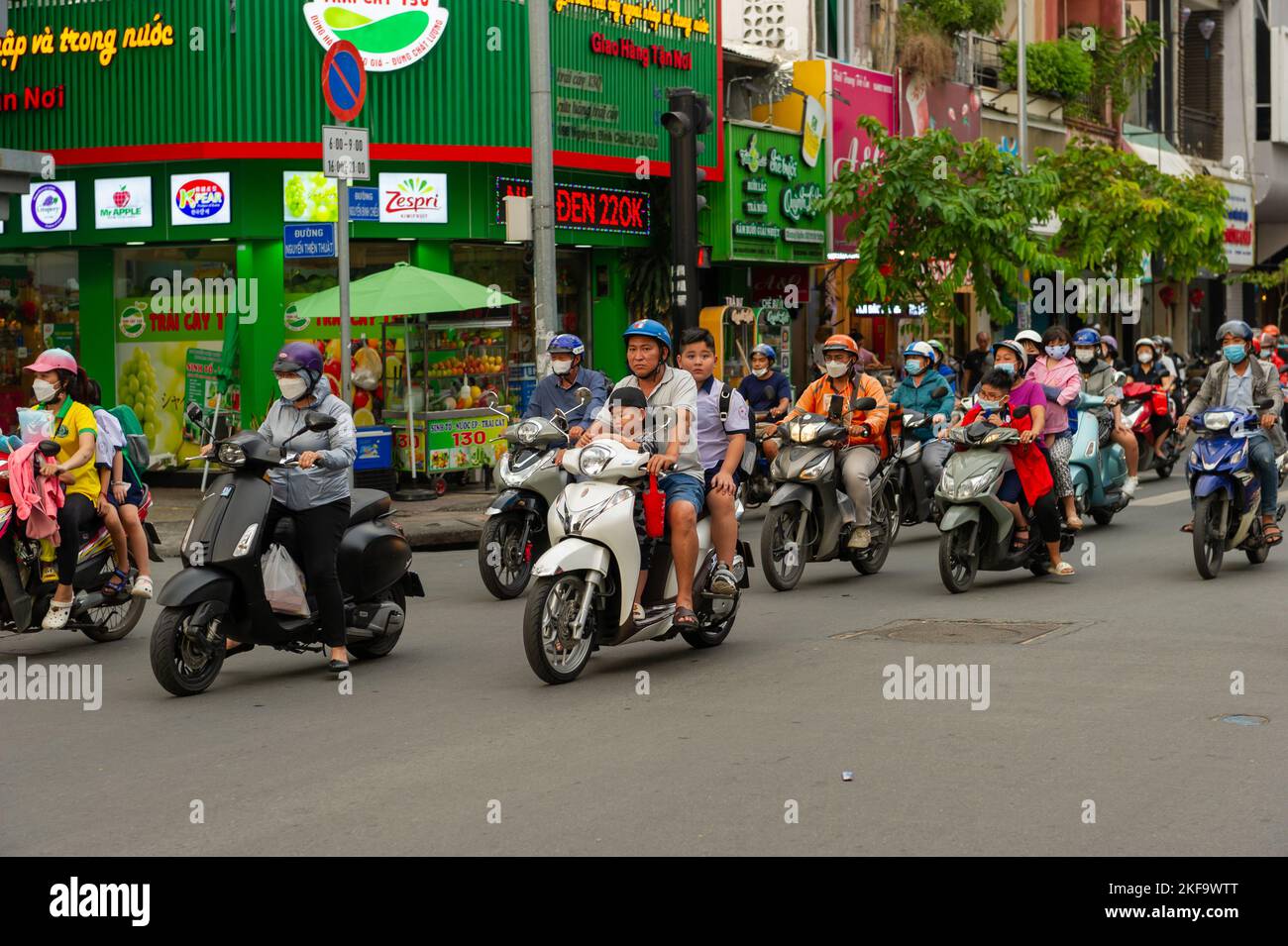 Saigon Street Life. A rush hour motorcycle swarm in Ho Chi Minh City ...