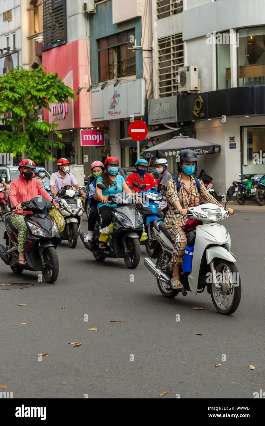 Saigon Street Life. A rush hour motorcycle swarm in Ho Chi Minh City ...