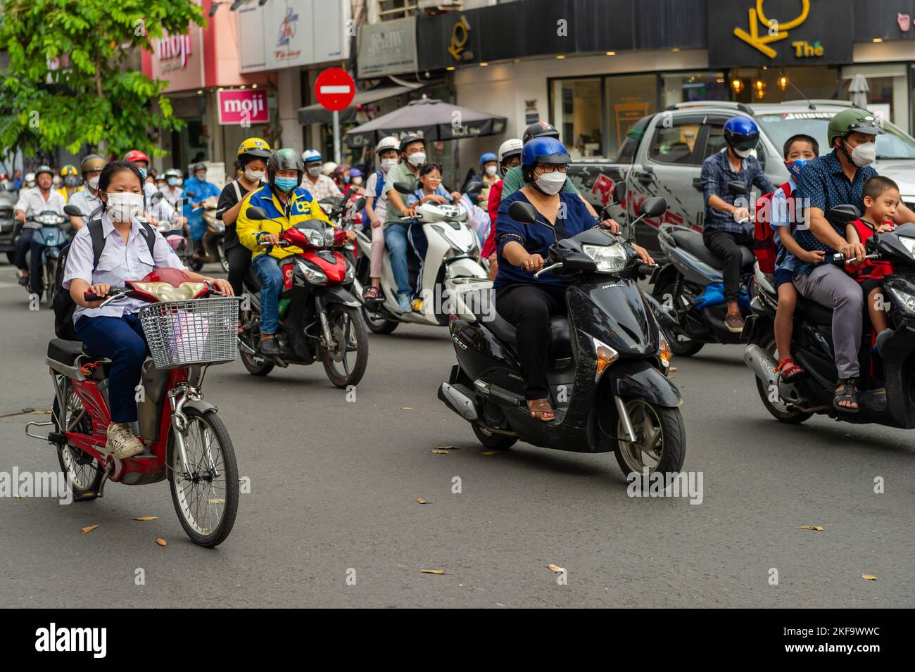 Saigon Street Life. A rush hour motorcycle swarm in Ho Chi Minh City ...