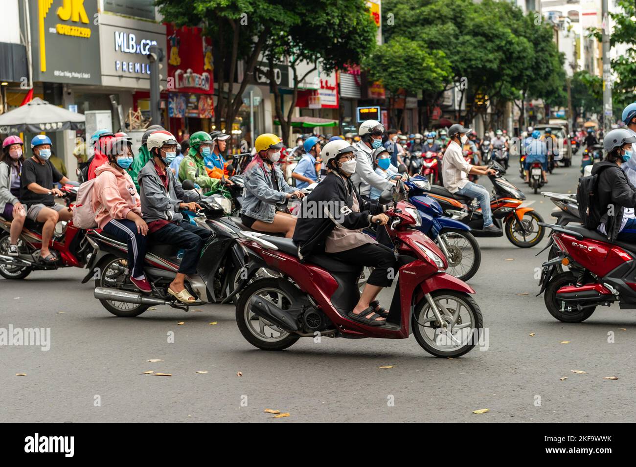 Saigon Street Life. A rush hour motorcycle swarm in Ho Chi Minh City ...