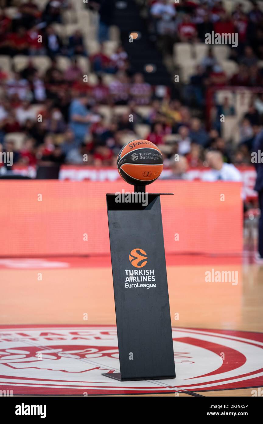A basket ball waiting at the center of the court during the start of a ...