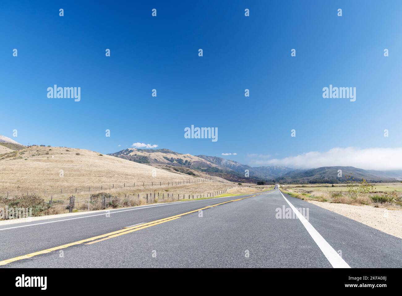 Asphalt road and country landscape Stock Photo - Alamy