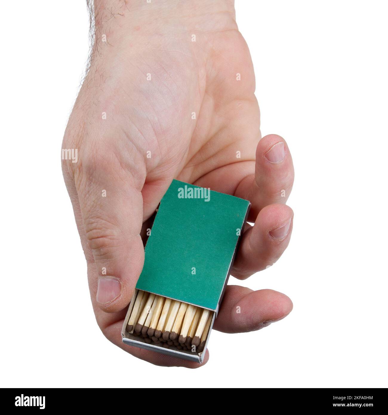 Close up of human hands with open green matchbox isolated on white ...