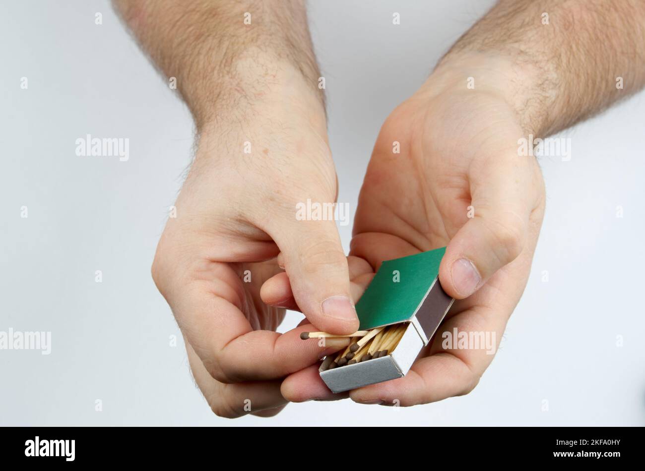 Hands holding matchbox hi-res stock photography and images - Alamy