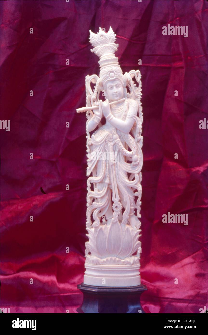 Carved Idol of Krishna in Ivory, India Stock Photo - Alamy