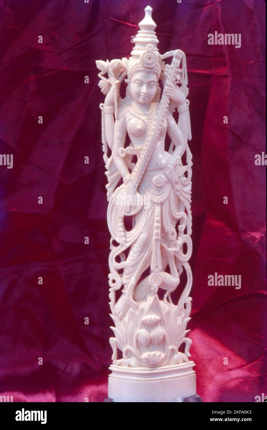 Delicately Carved Goddess Saraswati Idol in Ivory, India Stock Photo ...