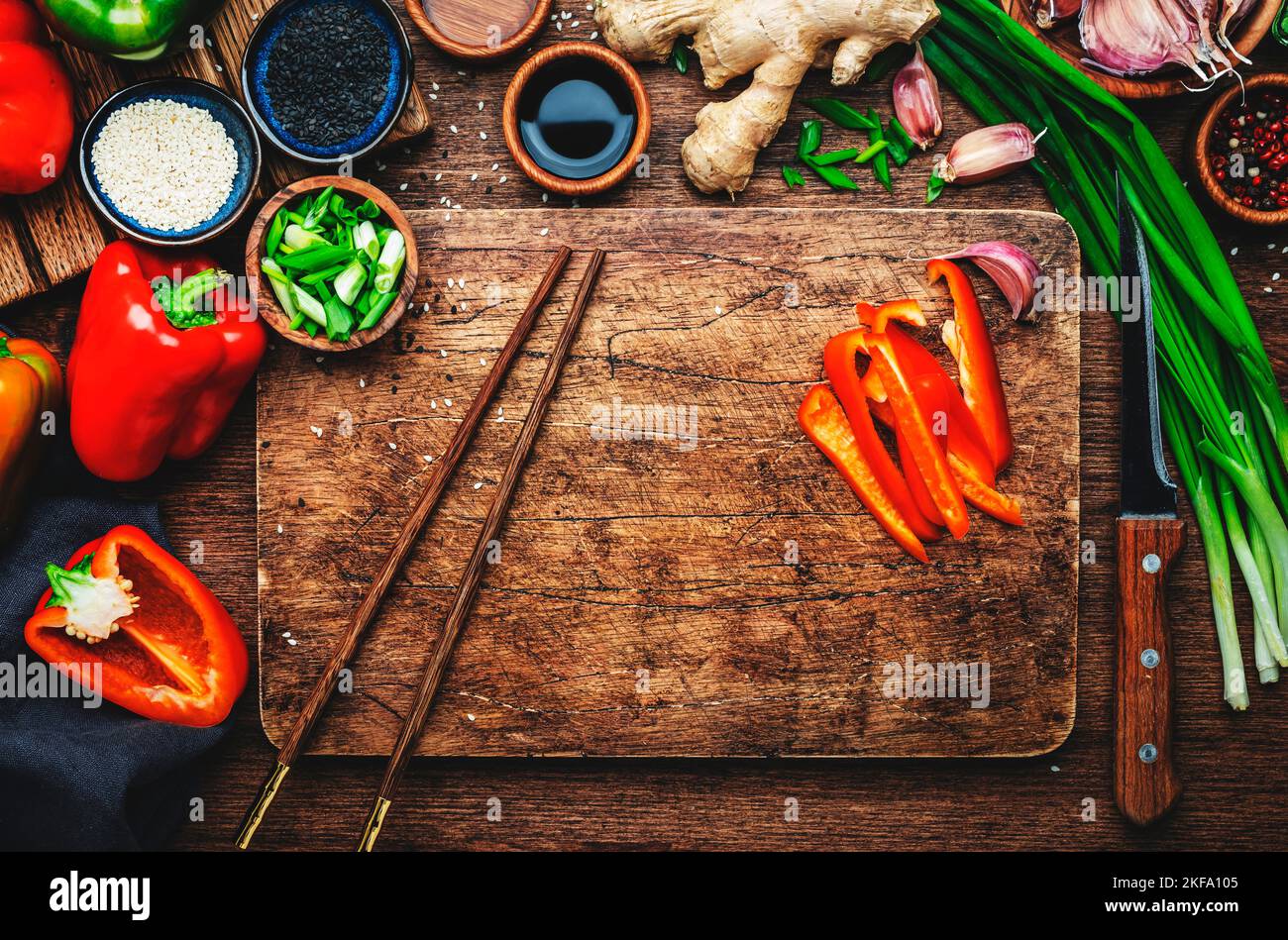 Food background. Asian cuisine cooking ingredients. Paprika, mushrooms ...