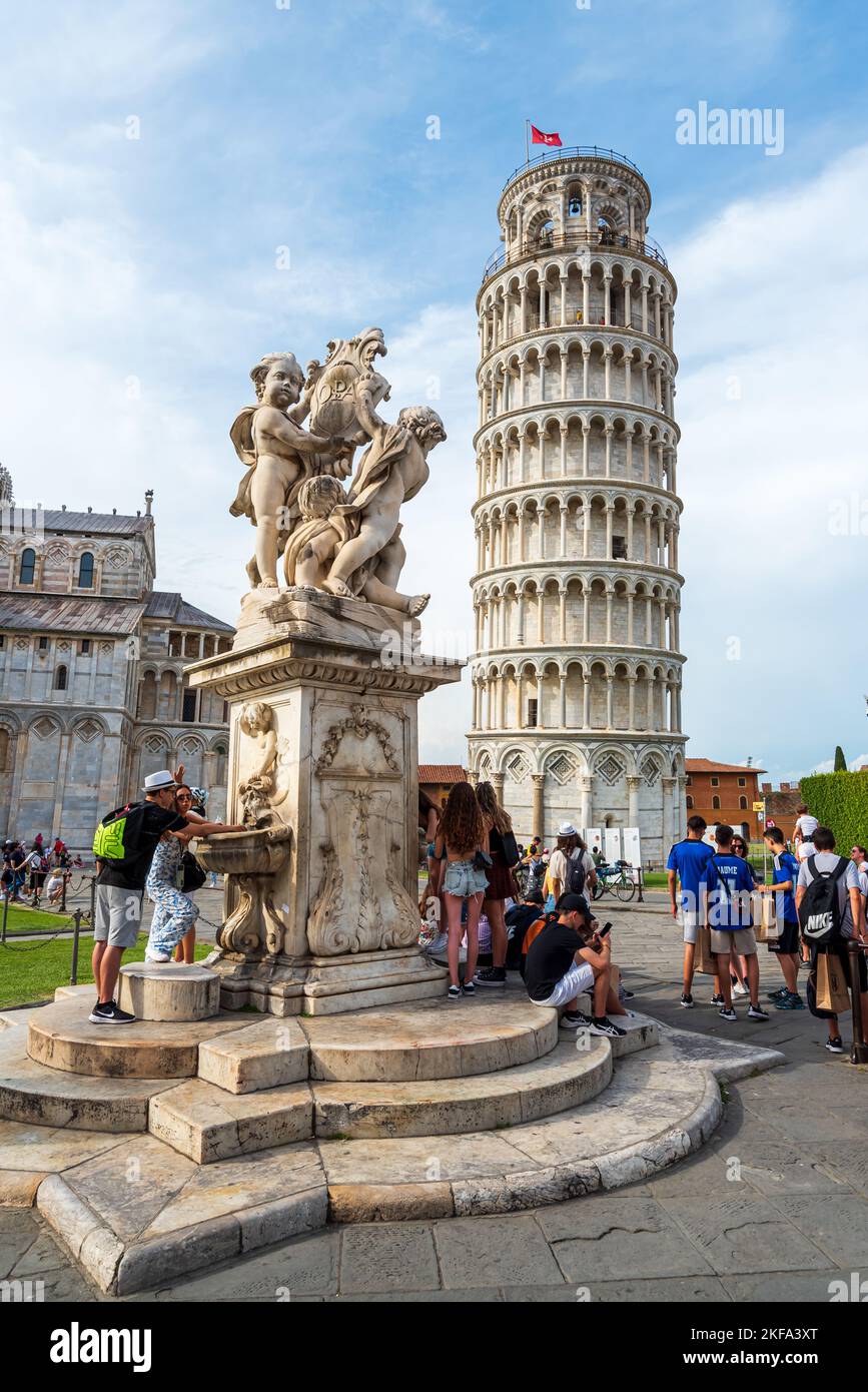Tourists around monument in front of the leaning tower in Pisa Stock ...