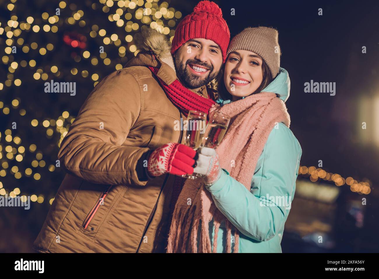 Photo of attractive lady handsome guy hold champagne glass toothy smile ...