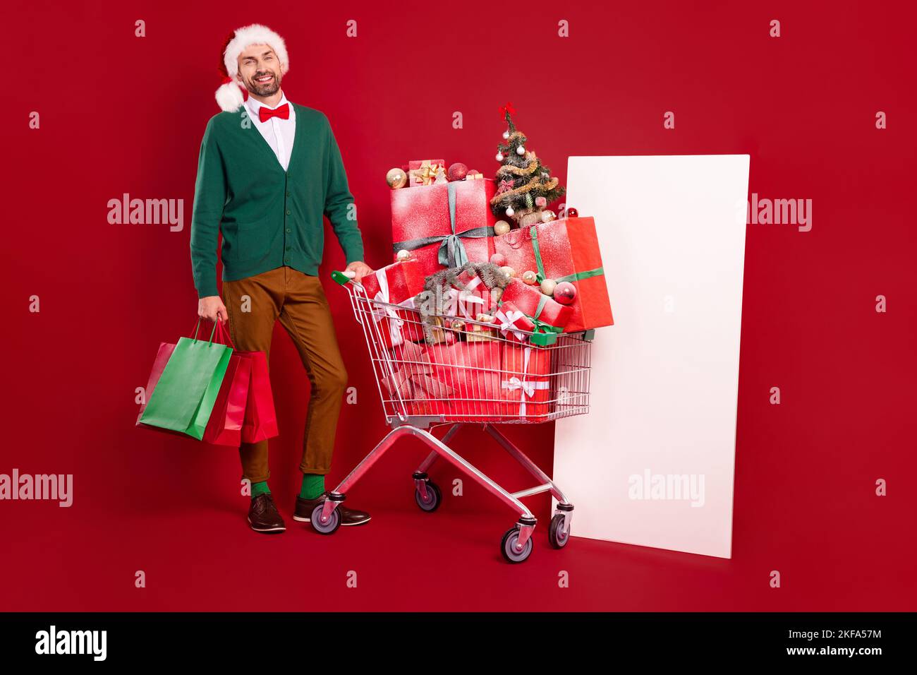 Full body photo of gentleman guy wear green cardigan red bowtie near ...